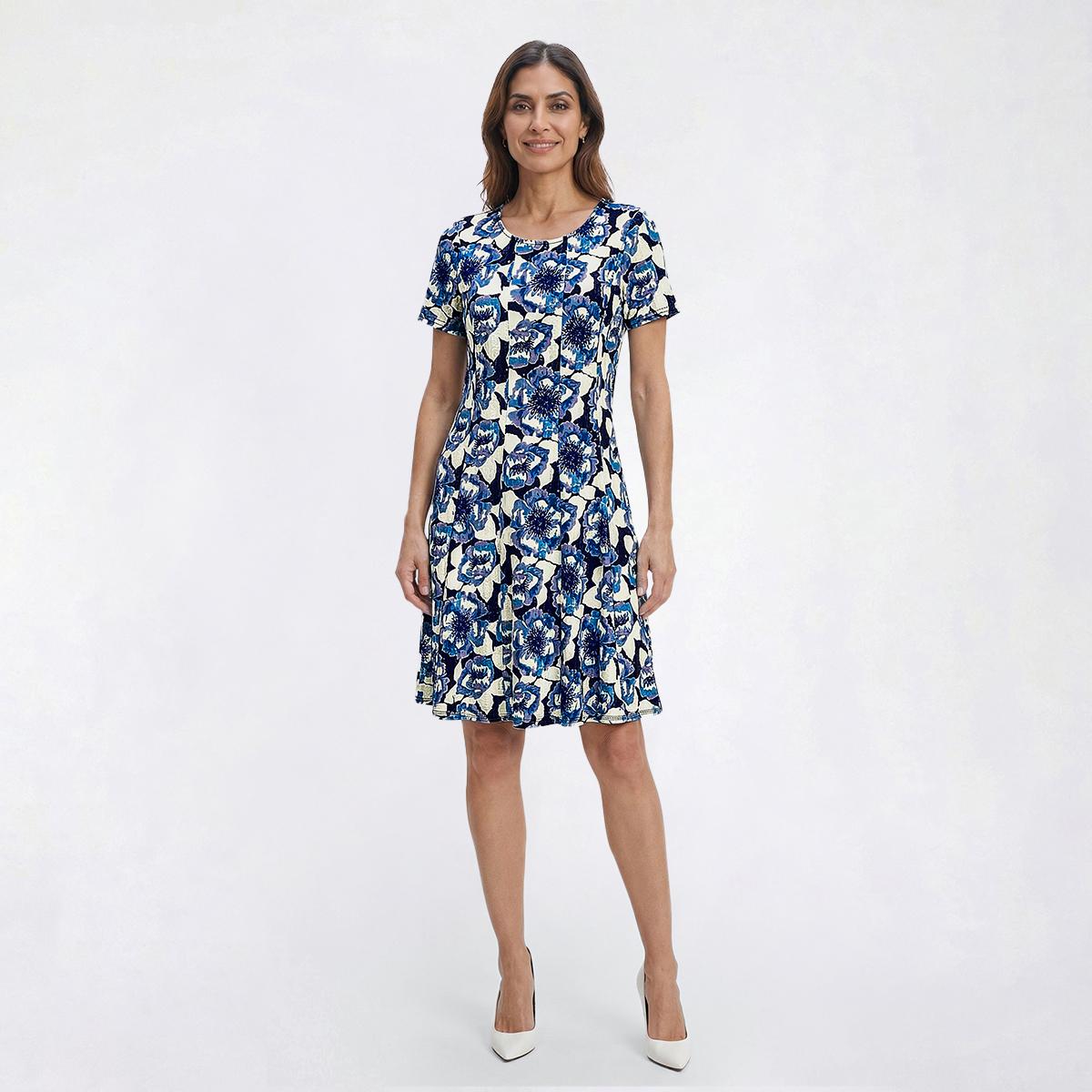 Click here for Petite Cocomo Short Sleeve Floral Gomez Panel Shif... prices